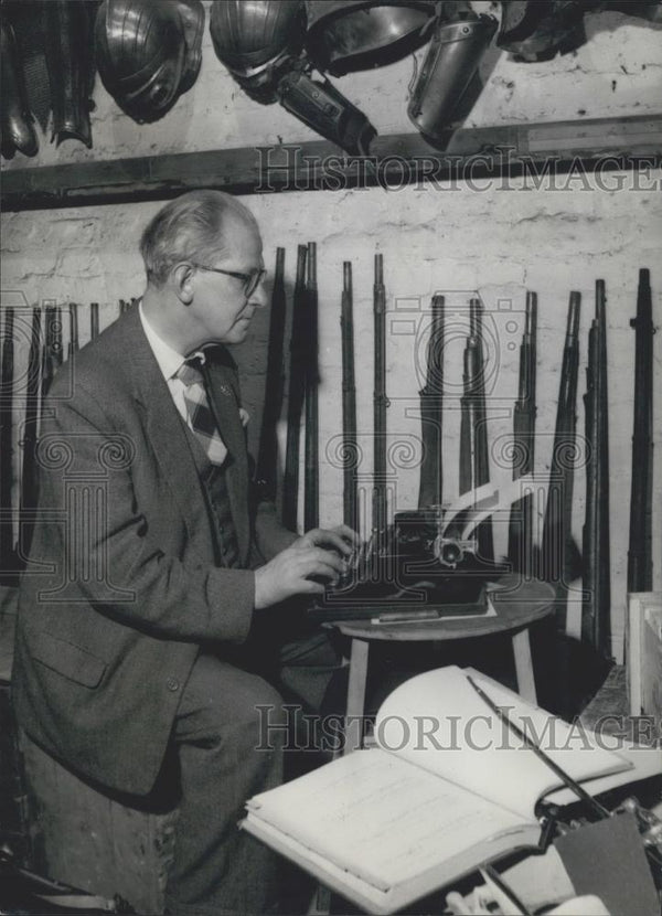 Press Photo Cyril Brasher Types Catalogue For Arm's Collection Royal O ...