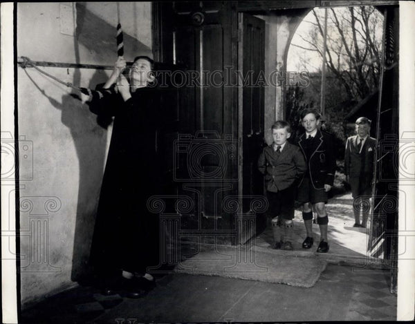 Press Photo Boy Ringing Bell St. Paul's Church For Children's Service ...