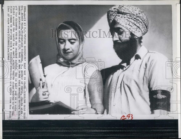 1964 Press Photo Pilot Jerrie Mock Checks Flight Data With IS Vedi In ...