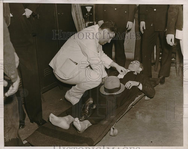 Doctor attending J.Statcher a PWA worker in a stretcher. 1938 Vintage ...
