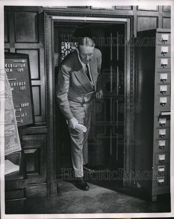 Dean Kenneth D. Johnson ducks to pass through Library door 1954 Vintage ...