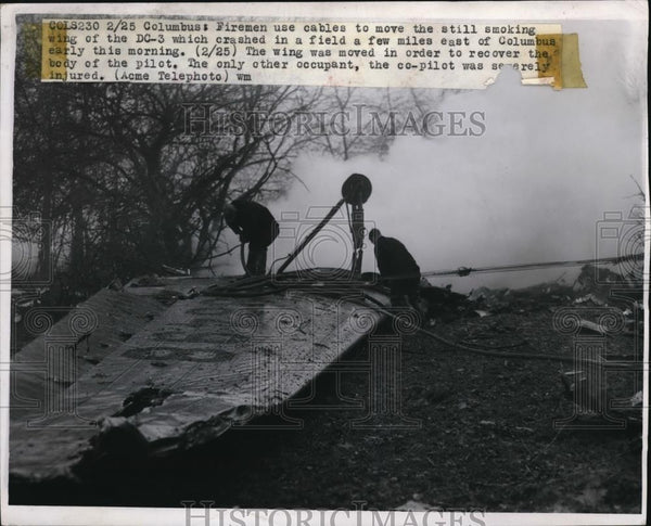 Columbus firemen use cables to move wing of DC-3 1948 Vintage Press ...