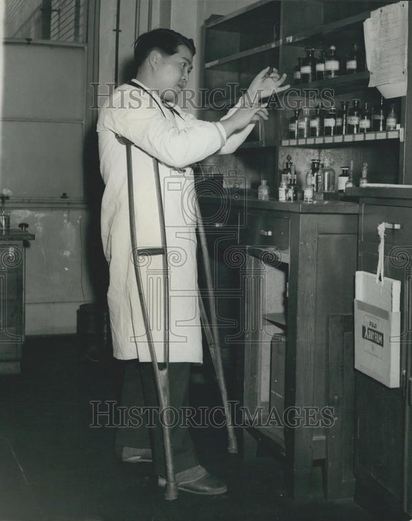 Press Photo Dr Courageous Dr. Watanbe Mixing His Own Prescriptions ...