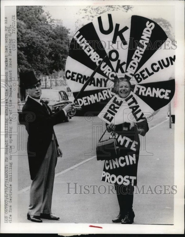 Mr. Ronald Shilling admires the common market hat worn by 1973 Vintage ...
