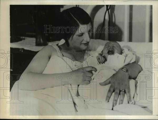 Mrs. Joseph John Sheehan enjoys a motherly moment with her baby 1932 ...