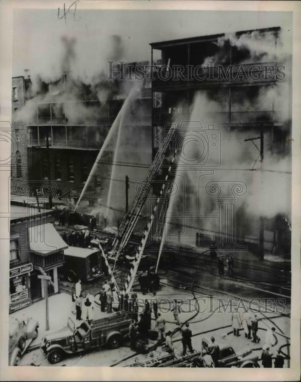1951 Press Photo Firemen Fight Blaze at Roman Catholic Orphaniage in M ...