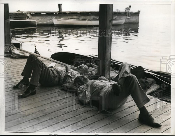 1938 Press Photo M.J McNamara and William Russell relax after feasting ...