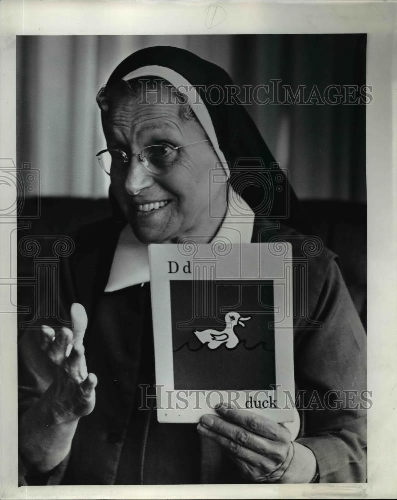 1975 Press Photo Sister Monica Foltzer reading teacher - orb45526 ...