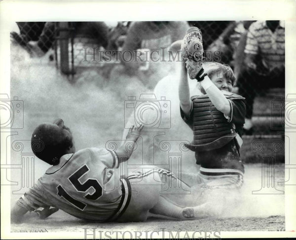 Press Photo Angie McCall shows jubilation after tagging Marcie Herwig ...