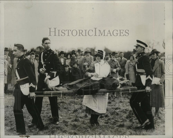 Nurse Watches Over Miss Jo Orpwood As She Carried Off The Field 1938 ...
