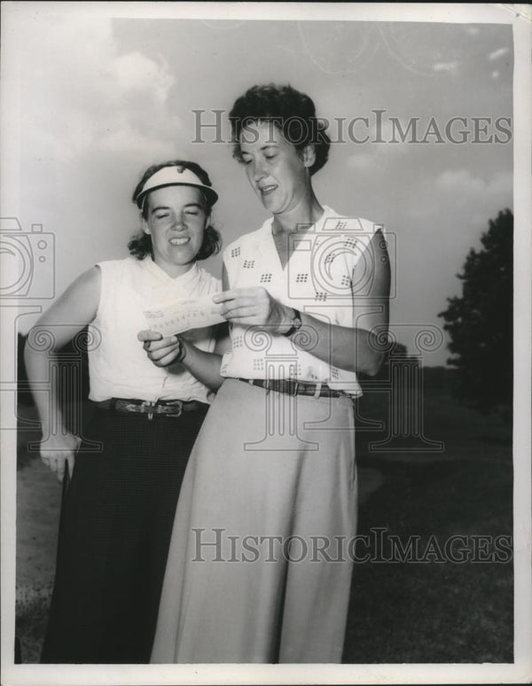 Golfers Patty Riley and Jean Hopkins examine score card 1953 Vintage ...