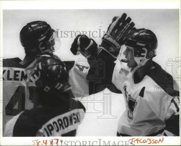 1991 Press Photo Spokane hockey's Kerry Toporowski, John Klemm, Brent ...
