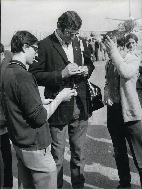 1968 Rugby Player Dauga Gives Autographs to Fans - Historic Images