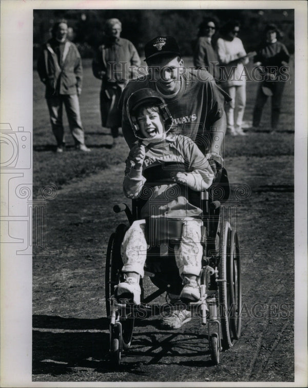 1990, Justin Levy brother Rob hitting Mick - RRU50979 - Historic Images