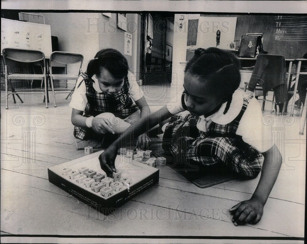 1970 Children Using Games Learn Reading - Historic Images