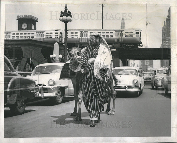 1953 Press Photo Publicist Jim Moran Posing As Arab Rug Salesman With ...