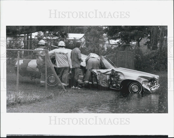 1987 Press Photo Firefighters Driver Car Accident Flipped Steven Kupel ...