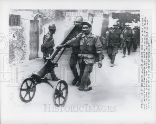 Algerian government troops wheel a gun into Fort National 1963 Vintage ...