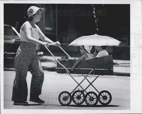 of Carla Castellano & kids enjoying stroll on First Ave. N. 1981 ...