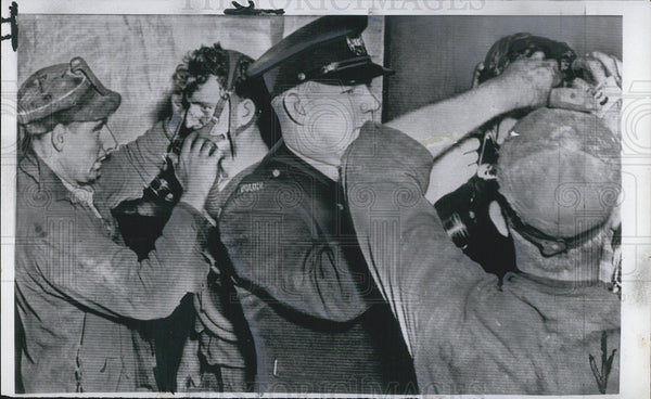 Draegerman assist eachother to entire mine rescue workers 1956 Vintage ...
