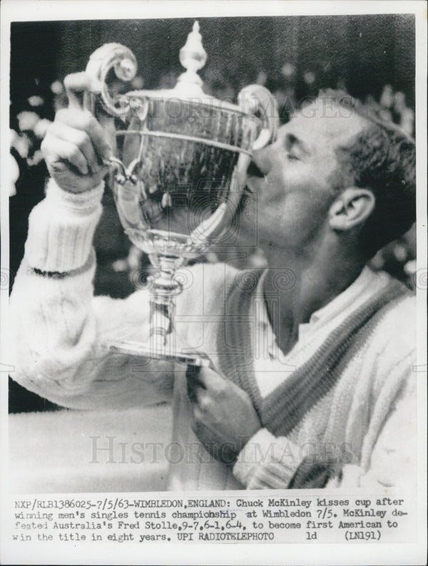 Chuck McKinley kisses cup at winning men's singles tennis 1963 Vintage ...