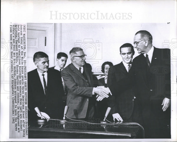 President Johnson at the White house greets three Americans freed after ...