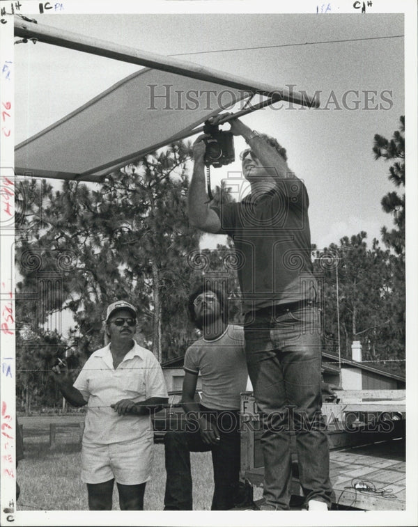1982 Tom Titus and Ray Ross make adjustments to their Ultralight ...
