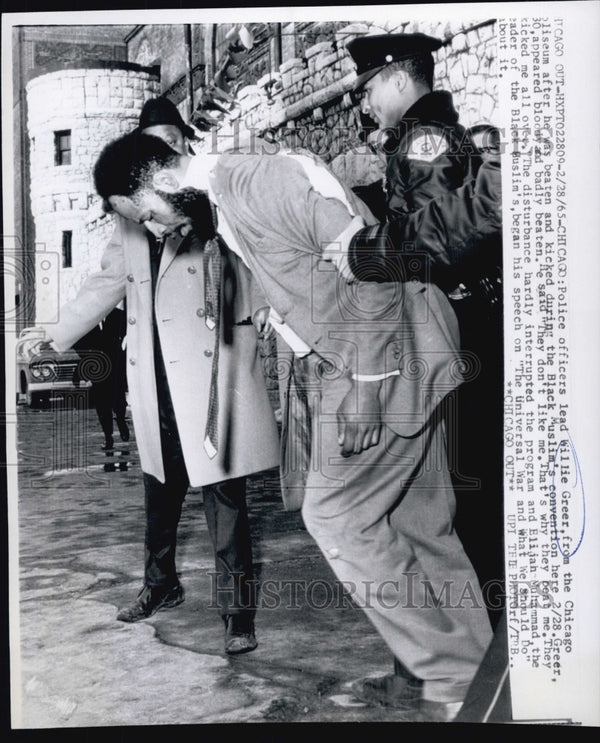 1965 Press Photo Willie Greer, was lead by police, after he was beaten ...