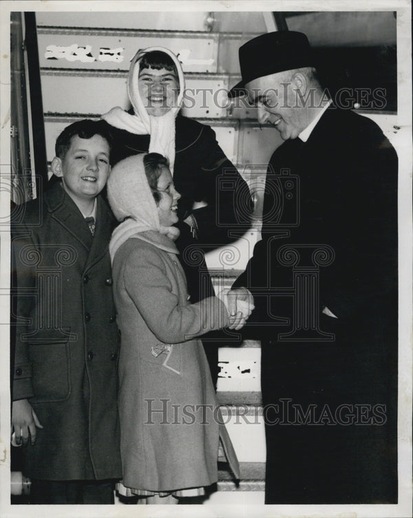 1961 Press Photo Angela O'Doherty greeted at Logan Int'l. Airport ...