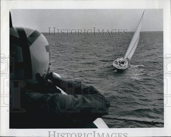 1964 Press Photo Air Crewman Robert Taaffe Making Evening Check of Sun ...