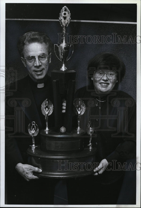 Rev. J. Joseph Kierce presents trophy to Brigid Carleton 1991 Vintage ...