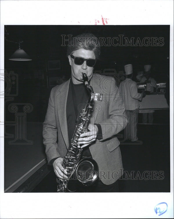 1993 man plays saxophone - RSM14593 - Historic Images