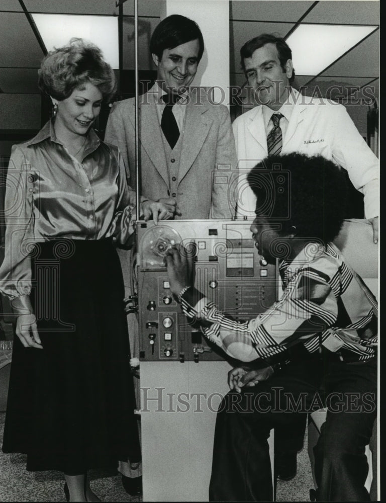1978, Alabama-Kidney patient adjust dials on kidney dialysis machine ...