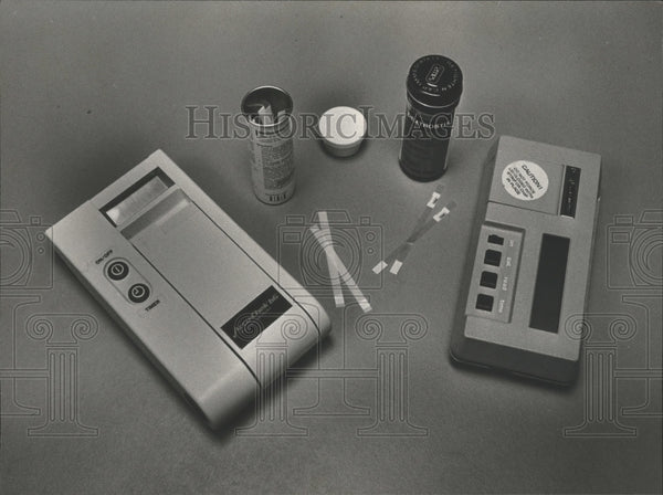 1983 Chemical test strips and machine used to check level of Glucose ...
