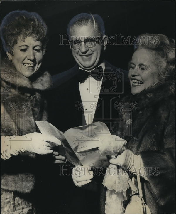 1969, Artist Doris Kennedy looks over program at opera - abna14204 ...