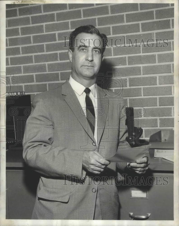 1958, Tom Shinn of Homewood Bank holding papers, Homewood, Alabama ...