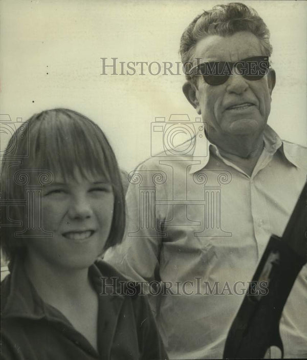 1973 J. Truett Payne, Jimmy Hinton Jr. with New Dove Gun - Historic Images