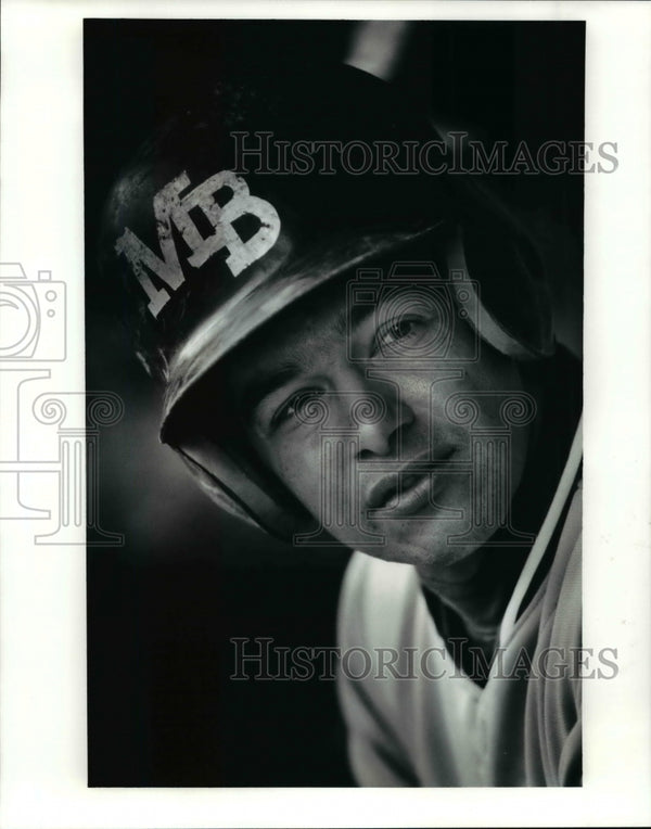 Press Photo Dr. Michael Maley chats with players in the dugout during ...