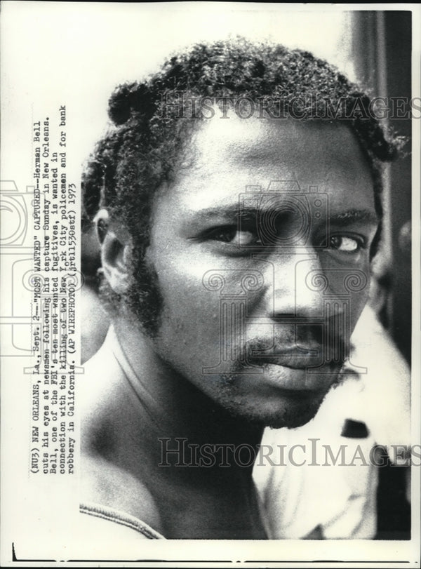 1973 Wire Photo Herman Bell cuts his eyes at newsmen in New Orleans ...