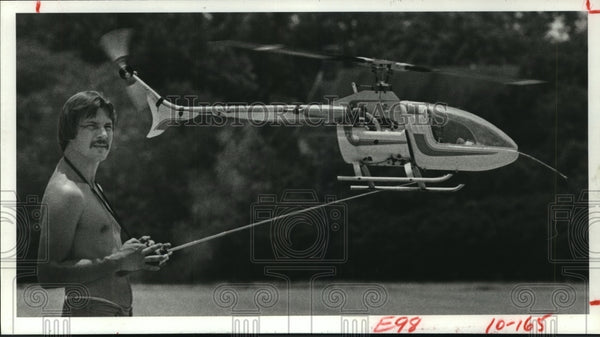1982 Hubert Bitner flies remote helicopter in Rice stadium, Houston ...