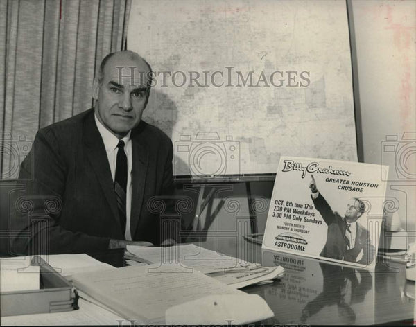 1965 Charles Riggs prepares materials for Billy Graham crusade ...