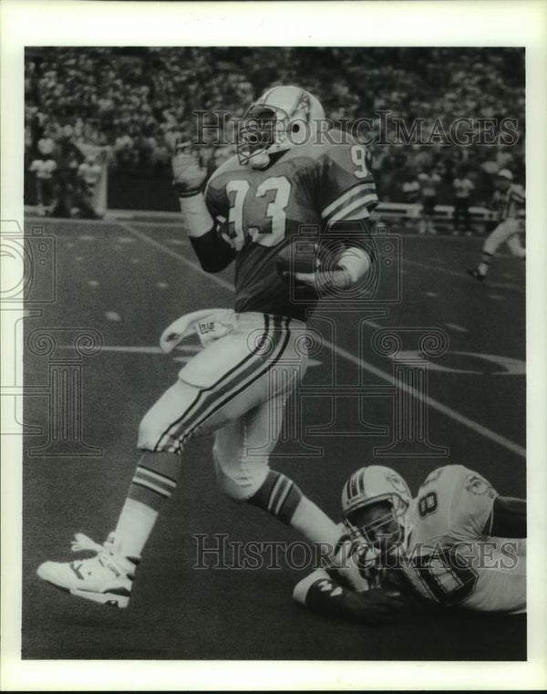1989 Press Photo Houston Oilers football player Robert Lyles runs back ...