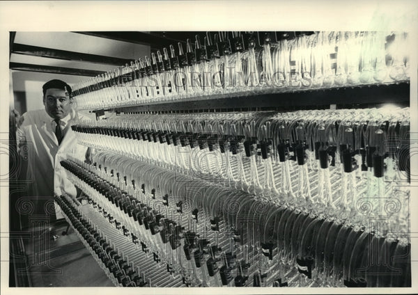 1983 Peter Bayne, President of Incell Corporation with Fractionater ...