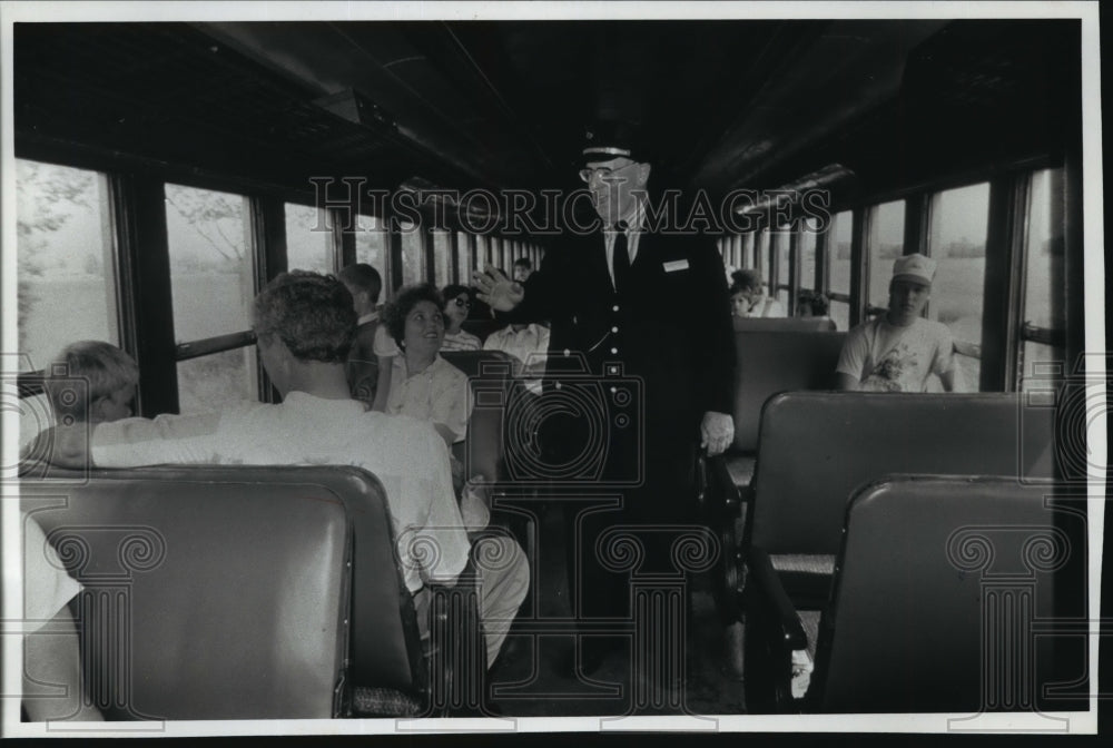 1990 Thomas Bullock answers questions and points out landmarks ...