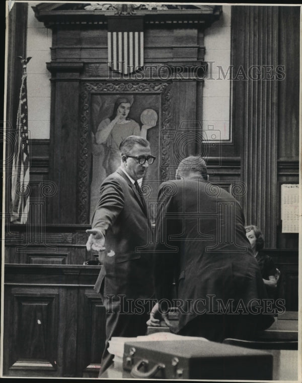 1965 Harry J. Daniels talks with prosecutor Richard L. Cates - Historic ...