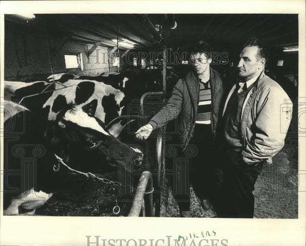 1986 Edith and Henry Gross Looking Over 65 Cows at Farm in Merrill ...