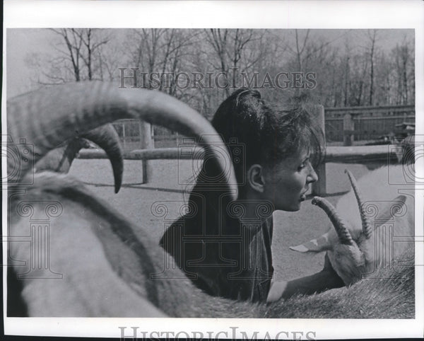 1972 Mrs. Fischer surrounded by animals at Milwaukee children's zoo ...