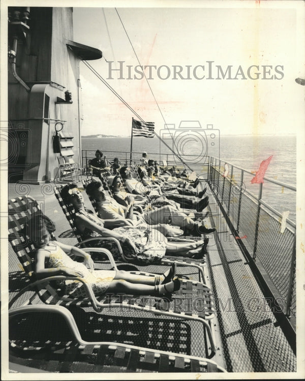 1957 Passengers lounge on deck of Milwaukee Clipper 7.5 hour trip ...