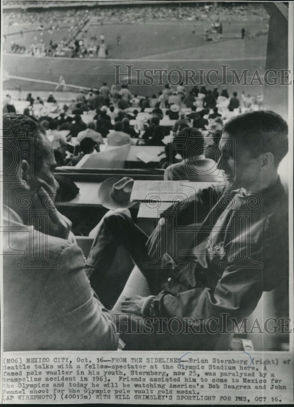 1968 Press Photo Brian Sternberg talks with spectator at Olympics, Mex ...