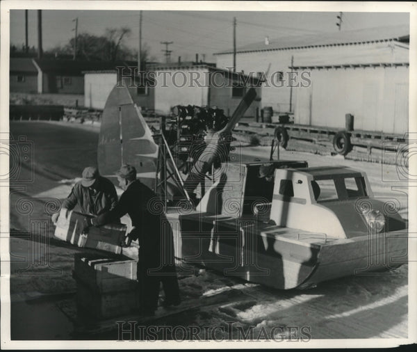 1956 Boxes of fish unloaded at Bayfield from the Russell sled ...